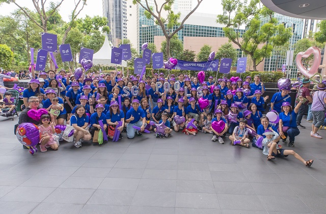 Singapore Pools Contingent: Marching in Purple for Inclusivity and ...