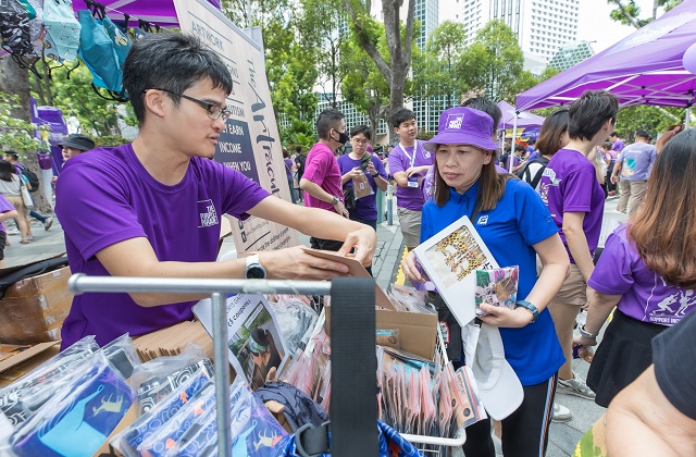 Singapore Pools Contingent: Marching in Purple for Inclusivity and ...